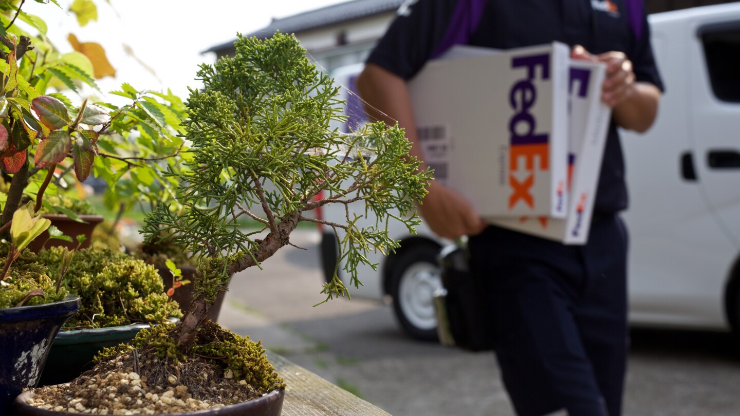 フェデックス、個人宅向け配送に写真付きの配達証明を導入