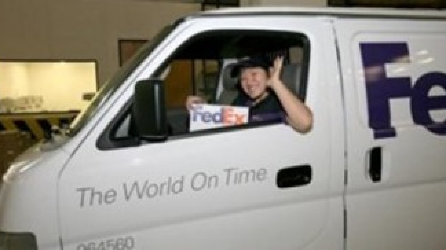 Tao Li Trades Swimwear to be FedEx Courier for a Day